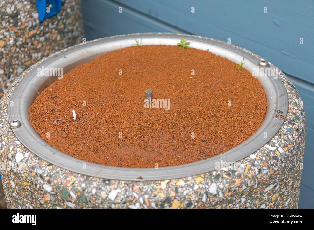 Big Round Ashtray Bin With Sand Pit Outside Stock Photo - Alamy