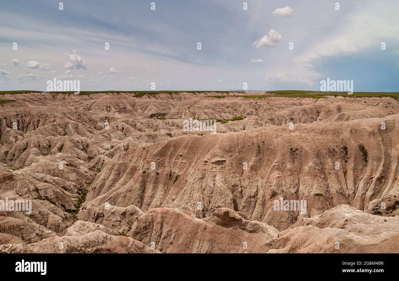 Badlands National Park, SD, USA - June 1, 2008: Wide landscape of beige ...