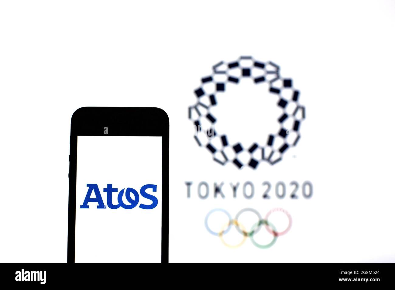 Spain. 20th July, 2021. In this photo illustration an Atos logo seen ...