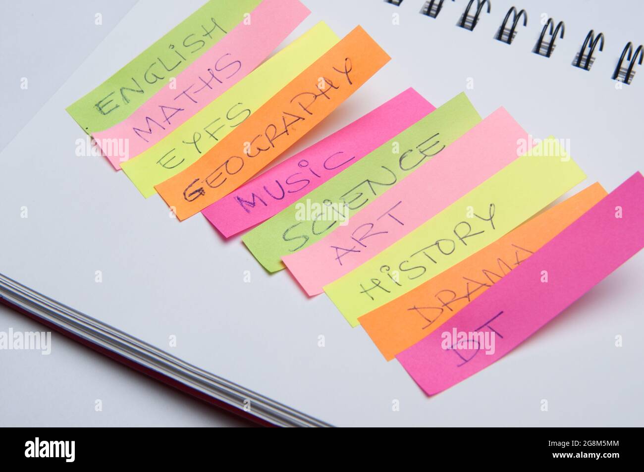 Scholar subjects handwritten on colored notes. White background Stock ...