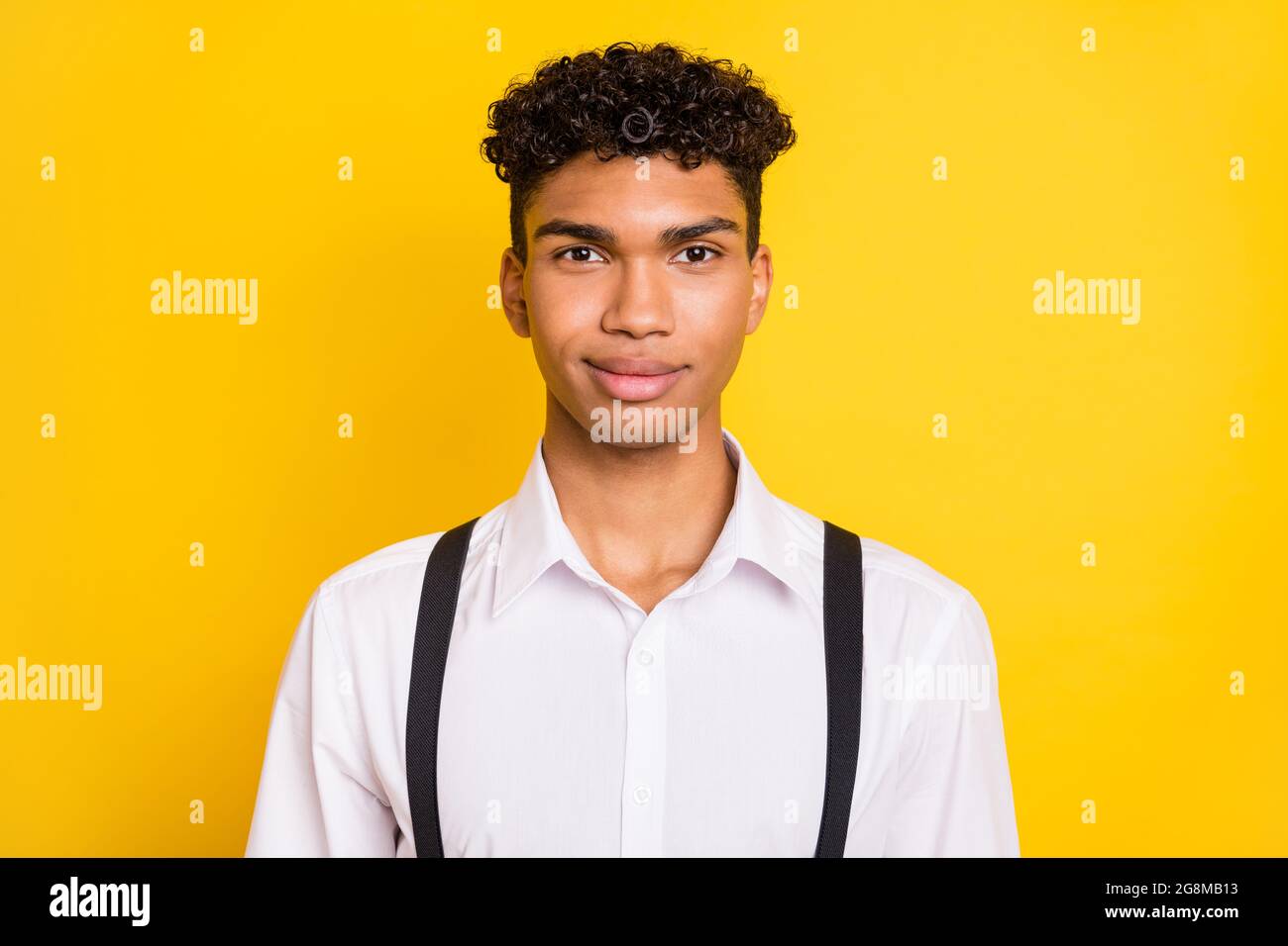 Photo portrait of african american guy smiling isolated on vivid yellow ...