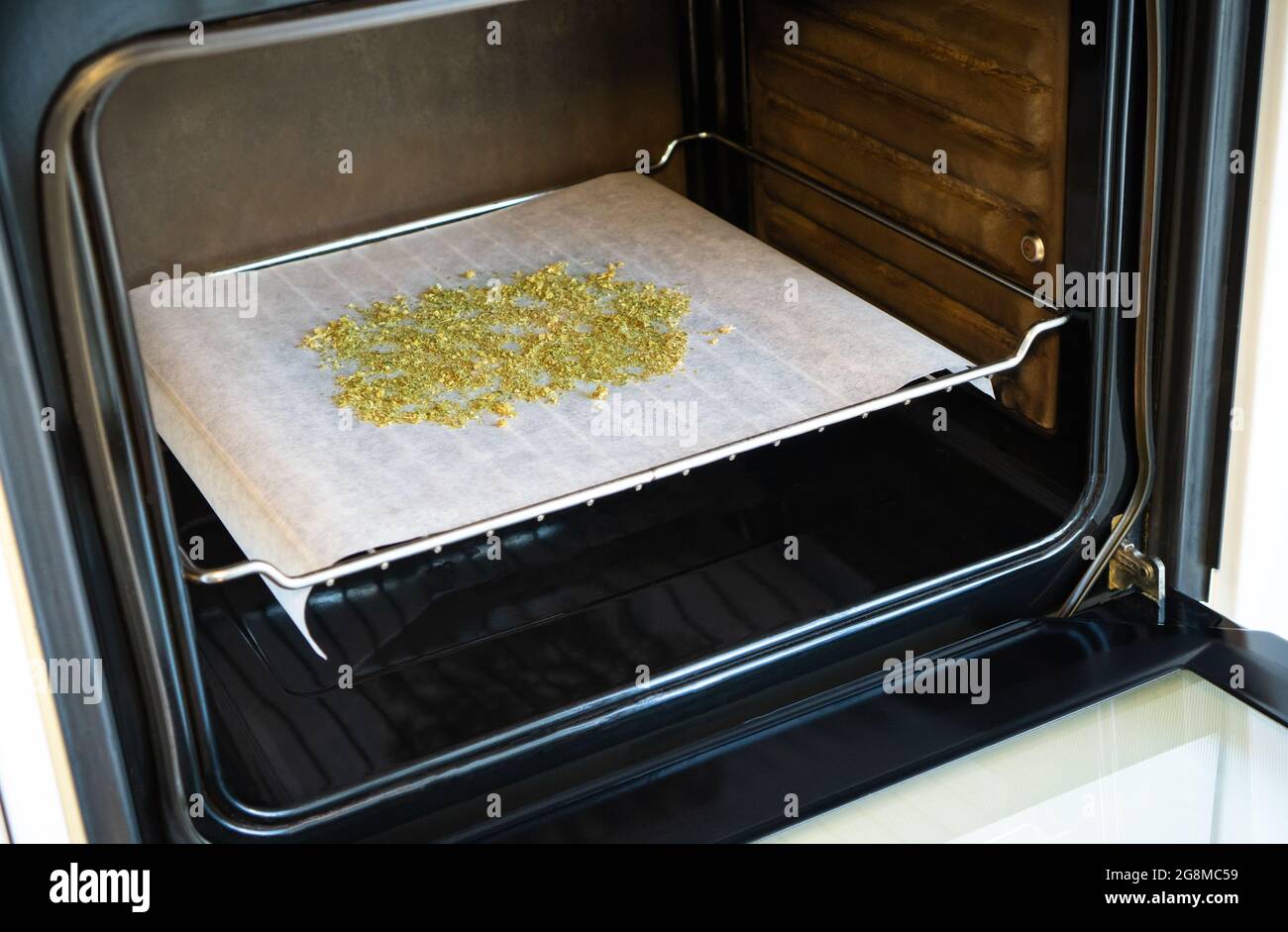 Cooking with marijuana. Baking cannabis buds to activate psychoactive ...