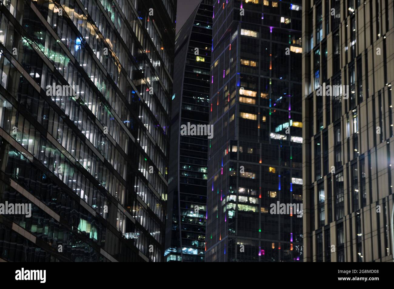 Facades of multi-storey office and residential buildings at night Stock ...