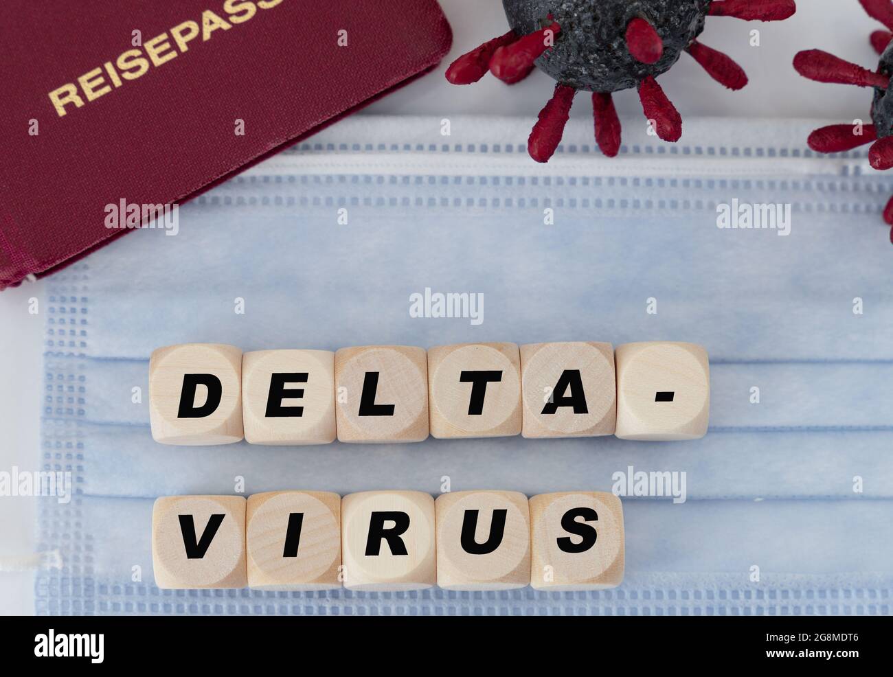 the word delta-virus with virus models and passport in the background ...