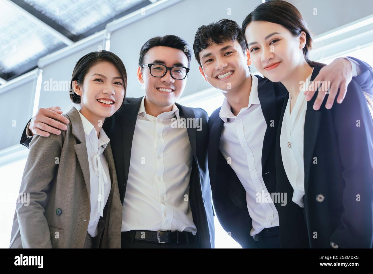 Men in suits hugging hi-res stock photography and images - Alamy