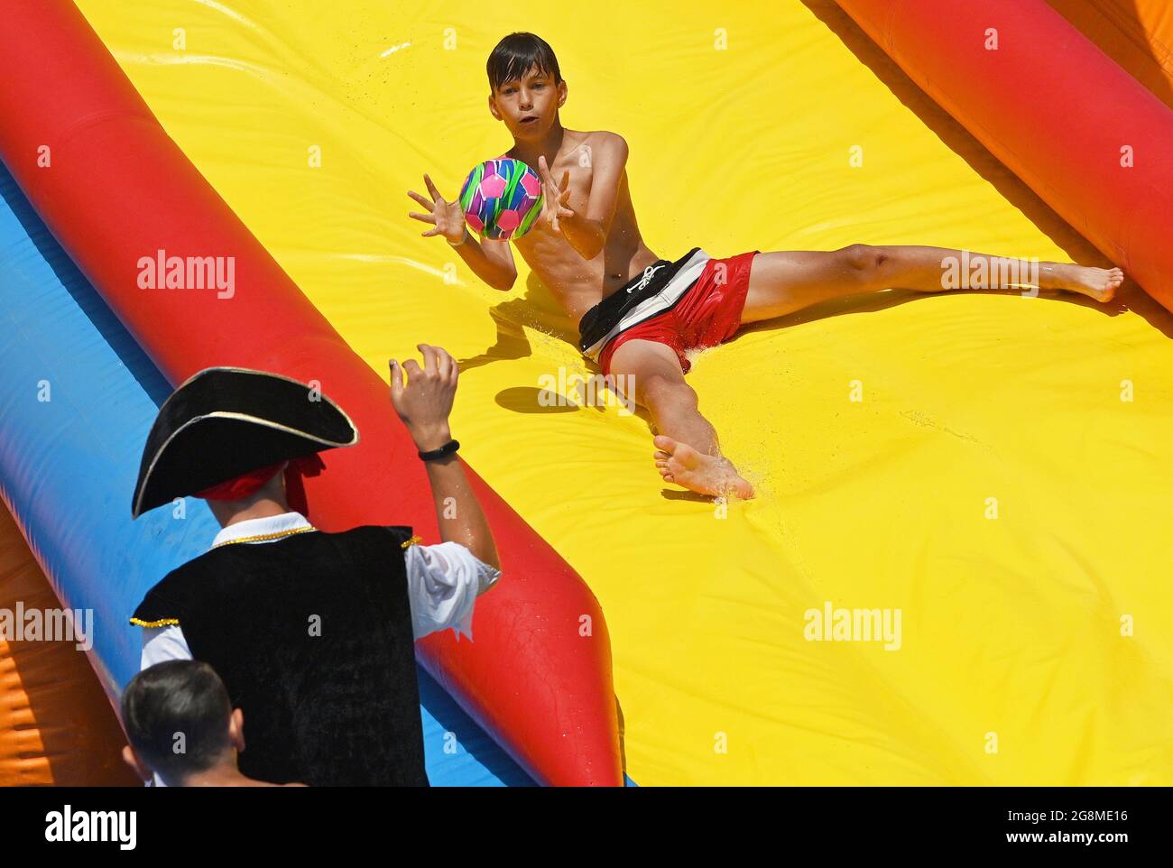 Non Exclusive: SIEVIERODONETSK, UKRAINE - JULY 10, 2021 - A boy tries ...