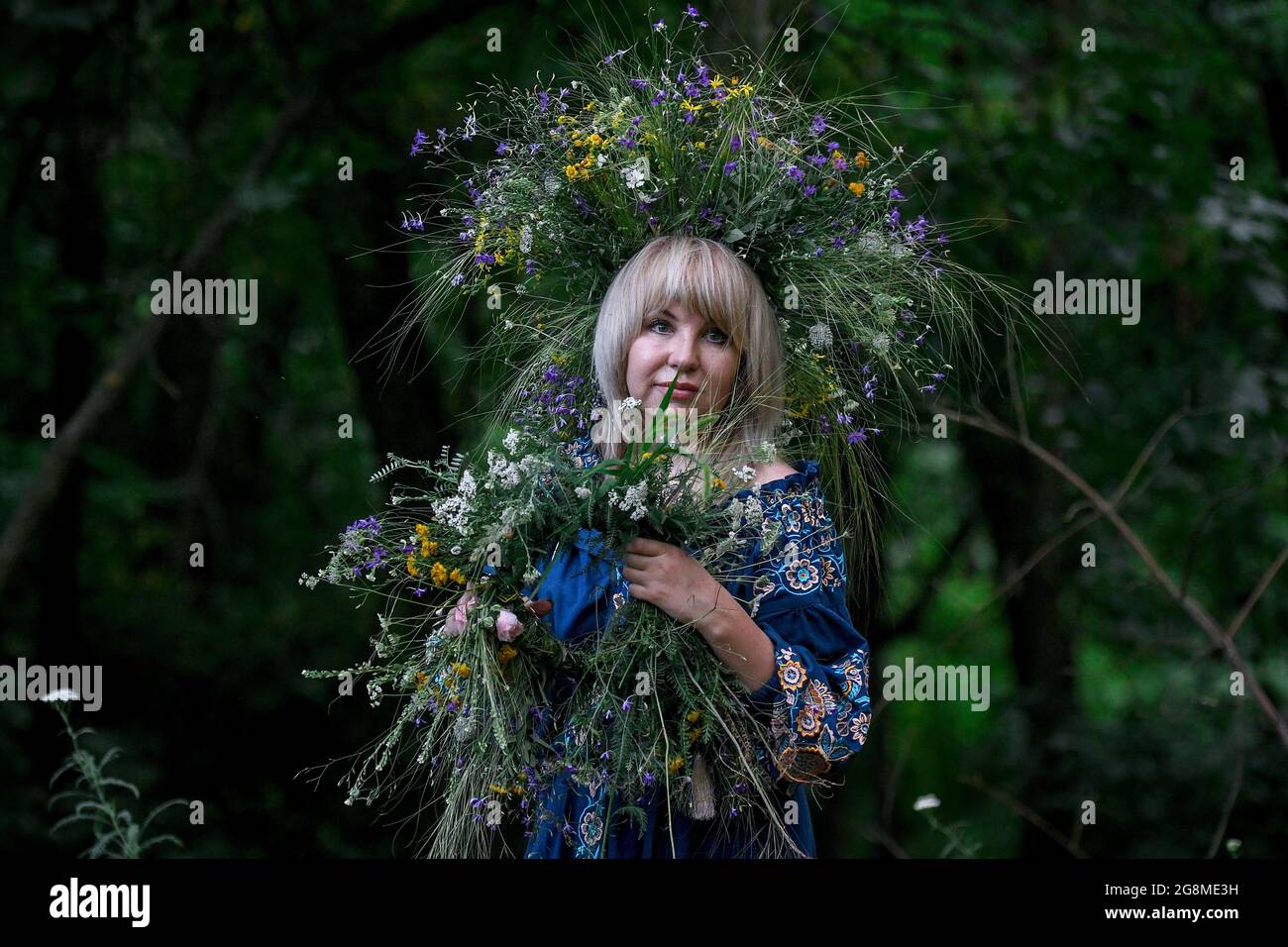 Non Exclusive: ZAPORIZHZHIA, UKRAINE - JULY 20, 2021 - A woman wears a ...