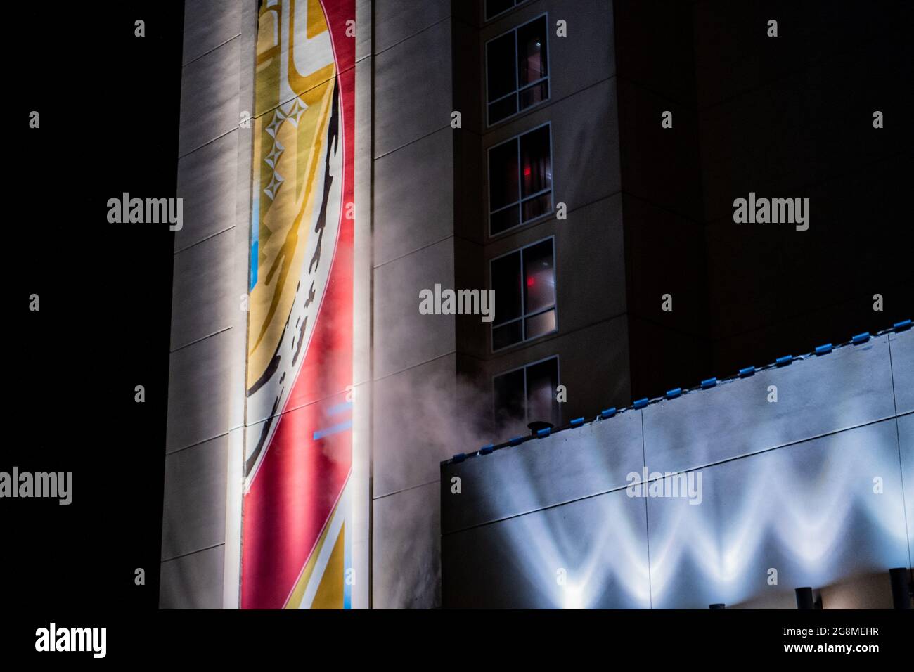 Beautiful facade of a building at night with lights Stock Photo - Alamy