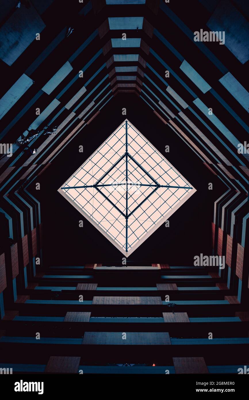 Low angle of a polygon corridor of a tall building Stock Photo - Alamy