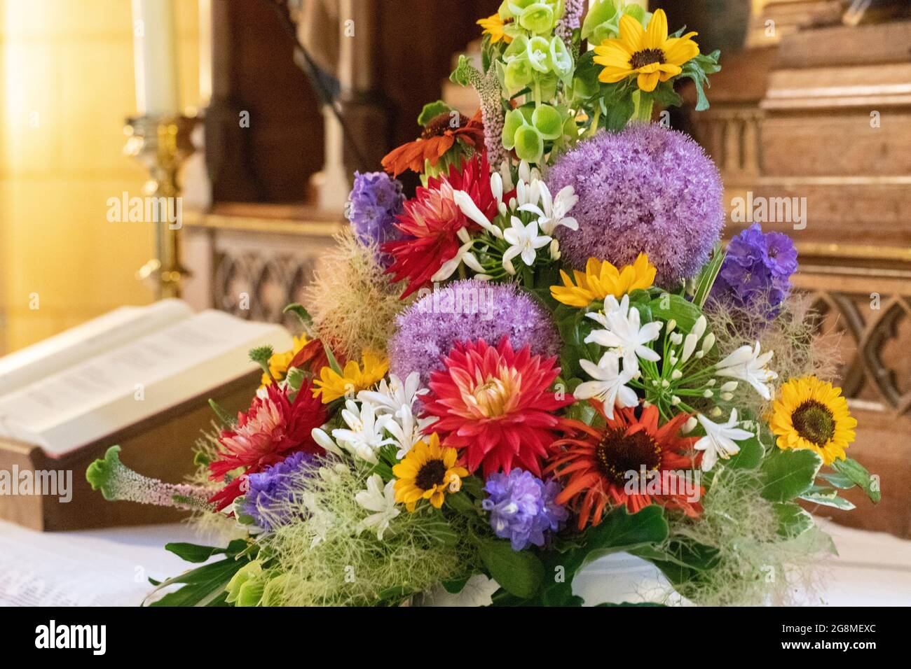 Colorful flowers on a church altar hi-res stock photography and images ...