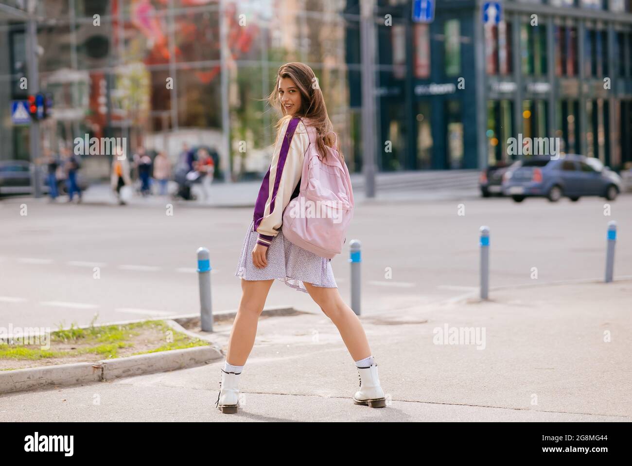 Pretty young woman, walking at the street Stock Photo - Alamy