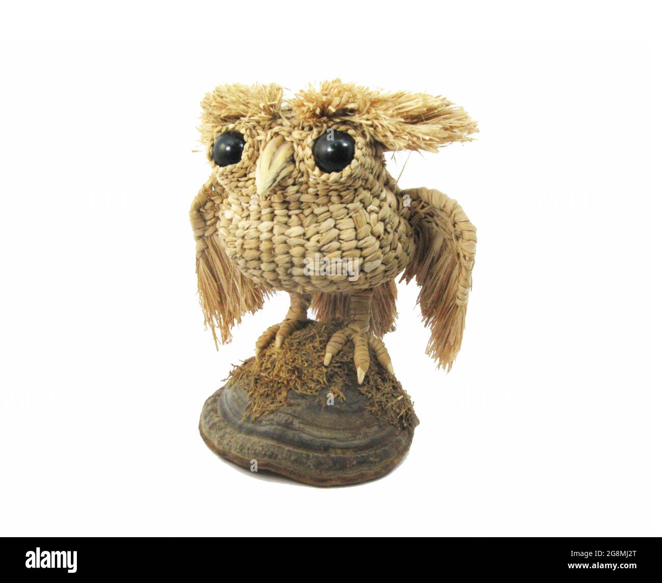 Handmade unique owl made of straw. Isolated on white background Stock ...