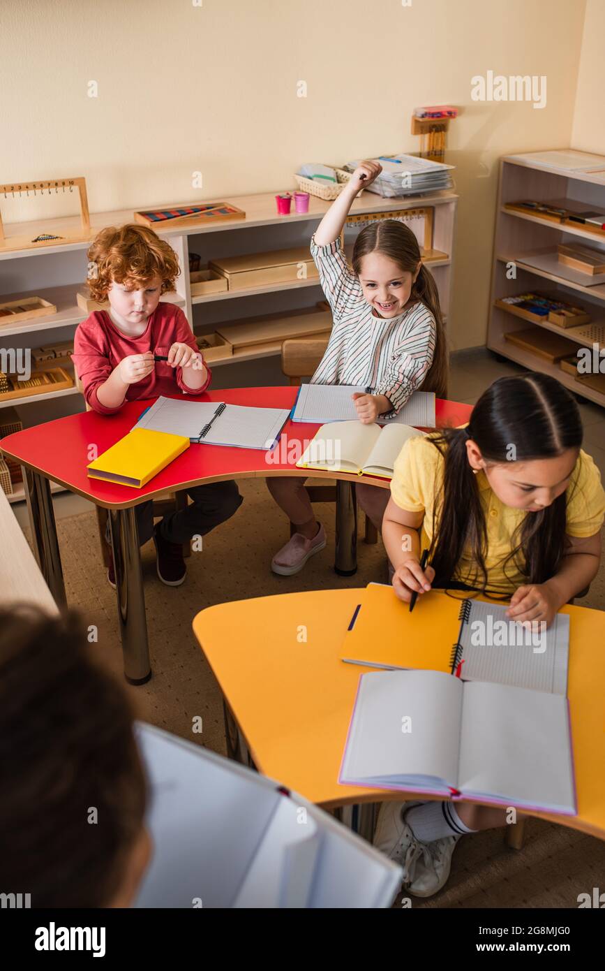 Excited Student Raising Hand