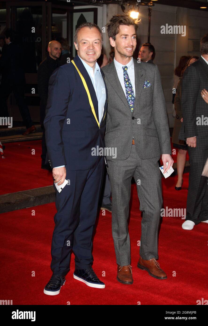 London. UK. Graham Norton and partner Trevor Patterson at the Opening ...