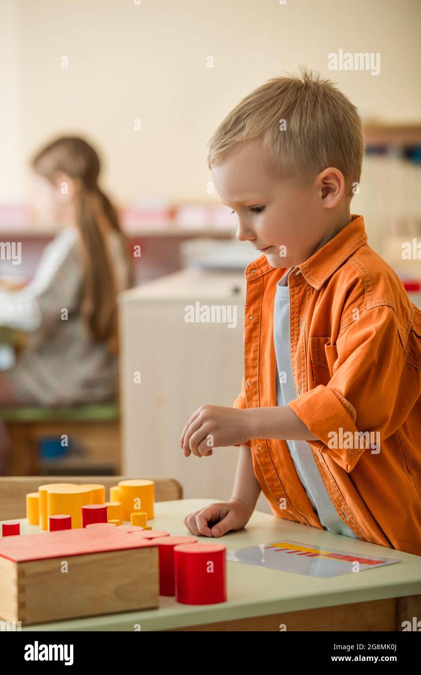 Kids playing with blocks in classroom hi-res stock photography and ...