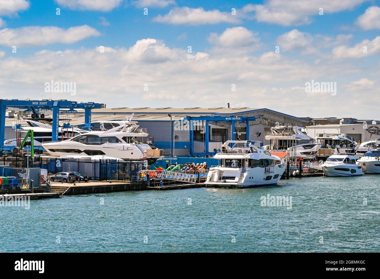 Poole, Dorset - June 2021: Luxury motor yachts outside the Sunseeker ...