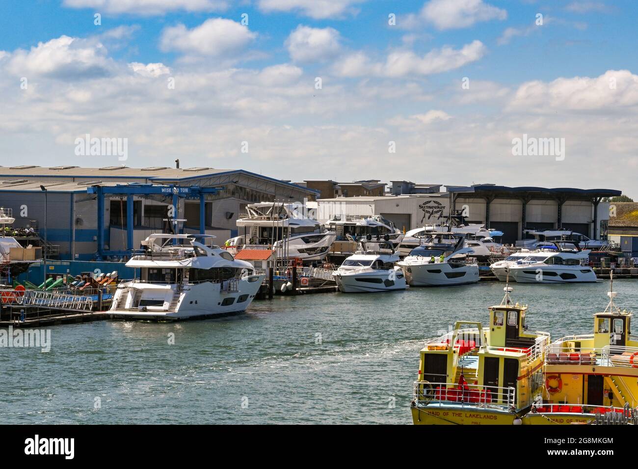 Poole, Dorset - June 2021: Luxury motor yachts outside the Sunseeker ...