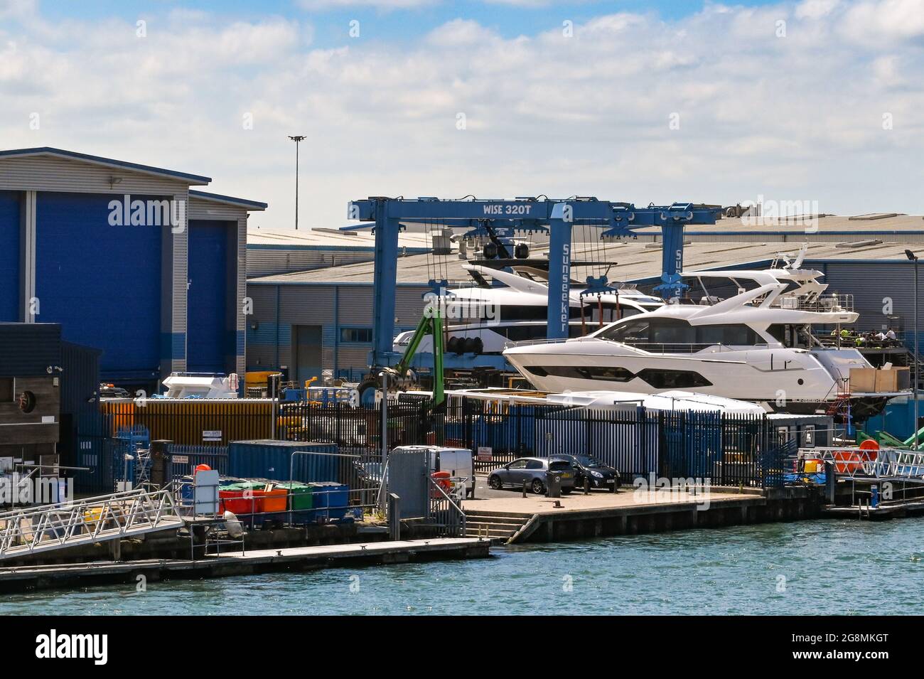 Poole, Dorset - June 2021: Luxury motor yachts outside the Sunseeker ...