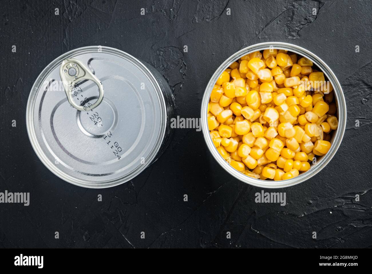 Canned corn in can, on black background, top view flat lay Stock Photo ...