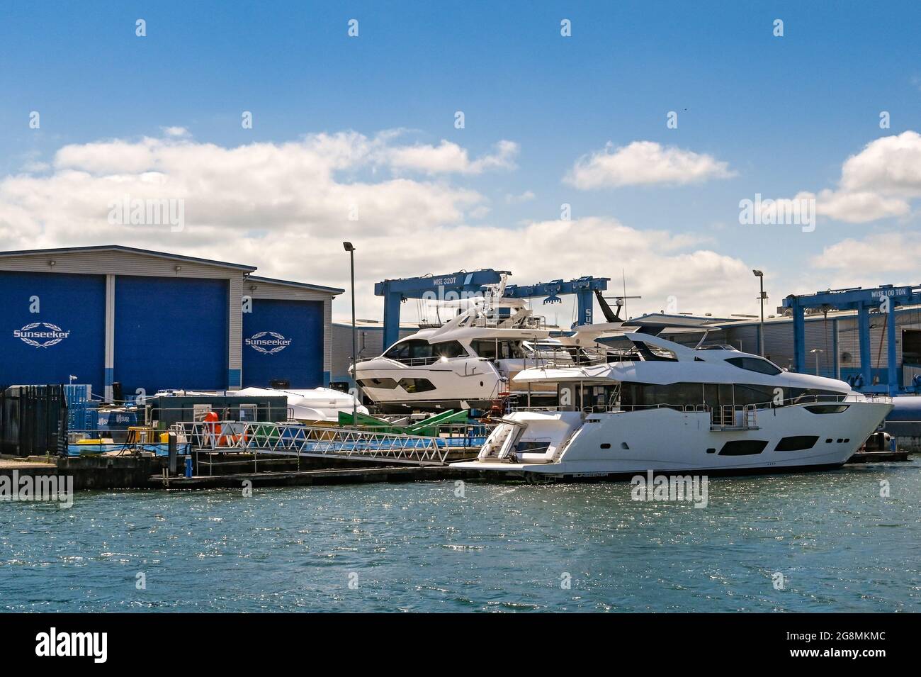 Poole, Dorset - June 2021: Luxury motor yachts outside the Sunseeker ...