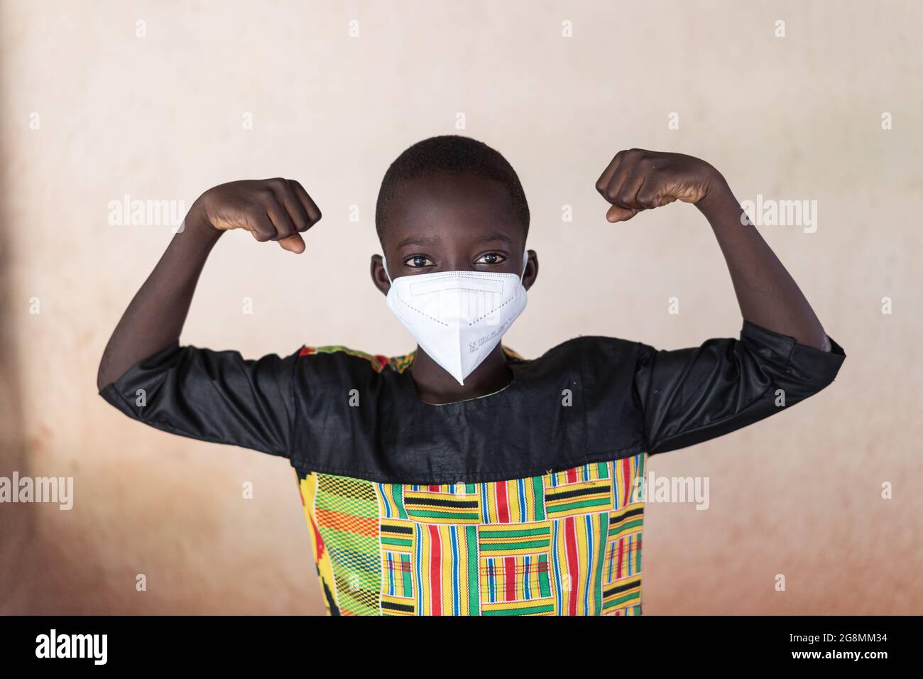 Boy showing muscles hi-res stock photography and images - Alamy