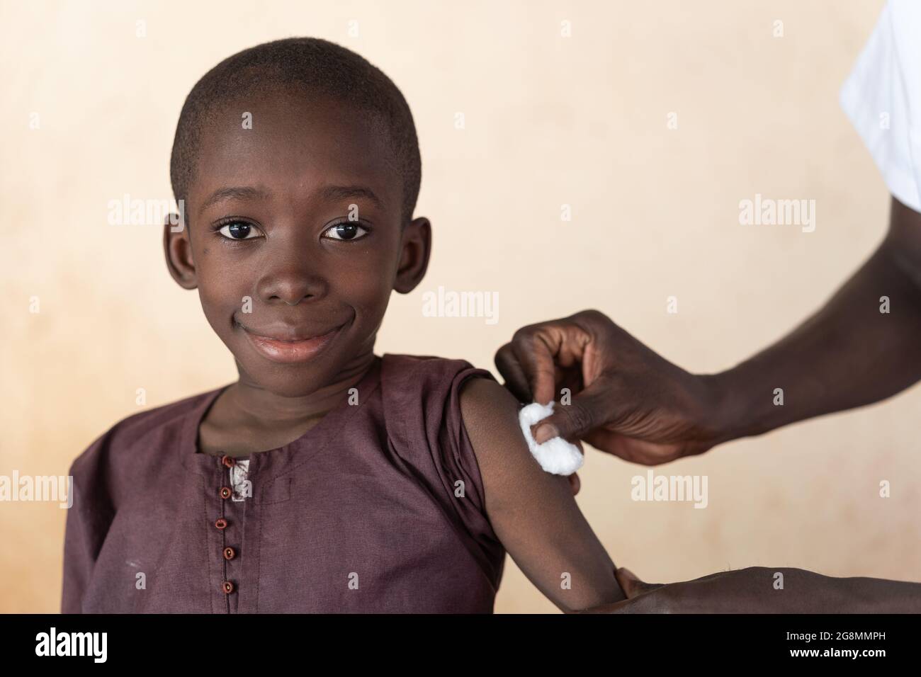 In this picture a black healthcare professional is cleaning the ...