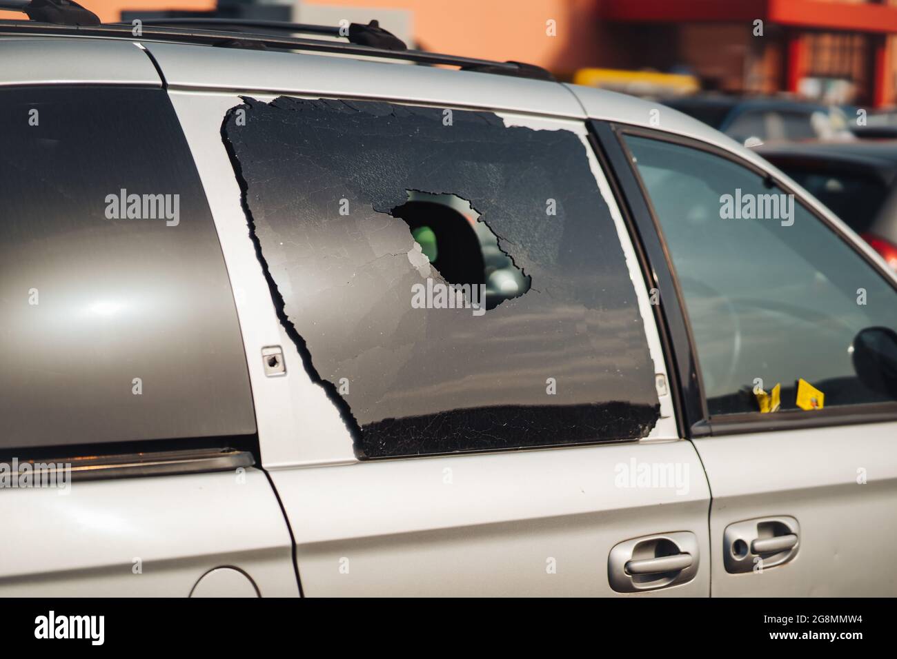 Theft from a parked car, intruders broke the rear window Stock Photo ...