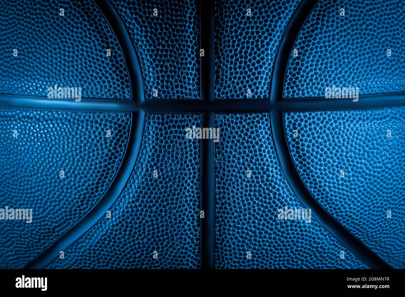 Closeup detail of basketball ball texture background. Blue neon Banner ...