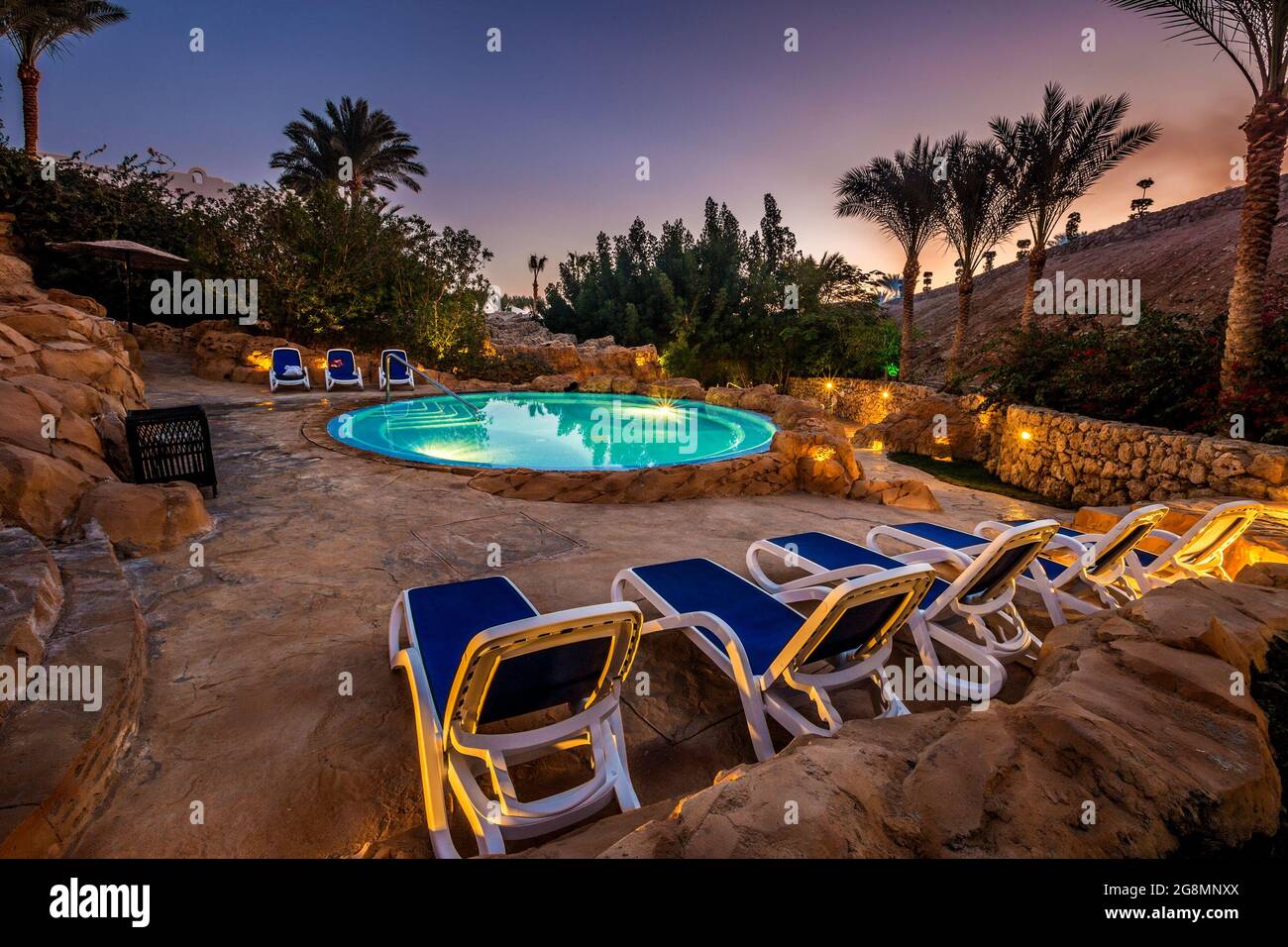 Evening view for luxury swimming pool in night illumination Stock Photo ...