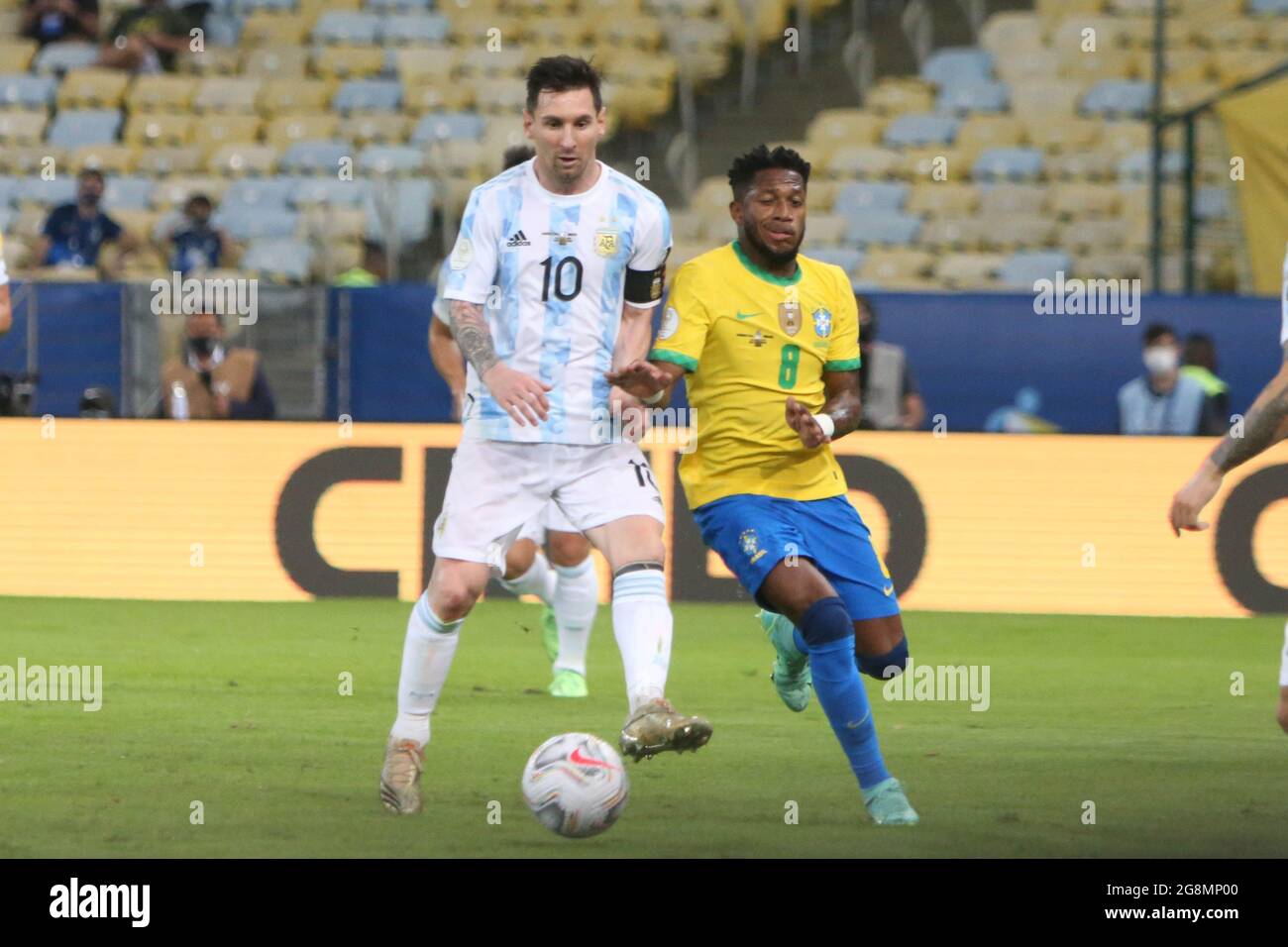 Lionel Messi of Argentina and Fred of Brazil During match between ...