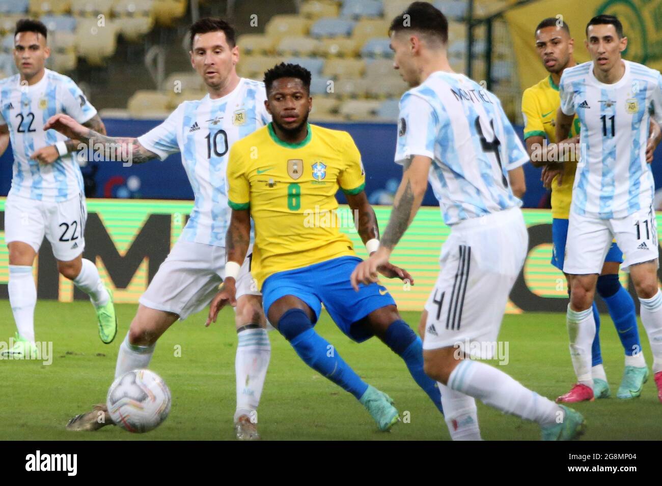 Lionel Messi of Argentina and Fred of Brazil During match between ...