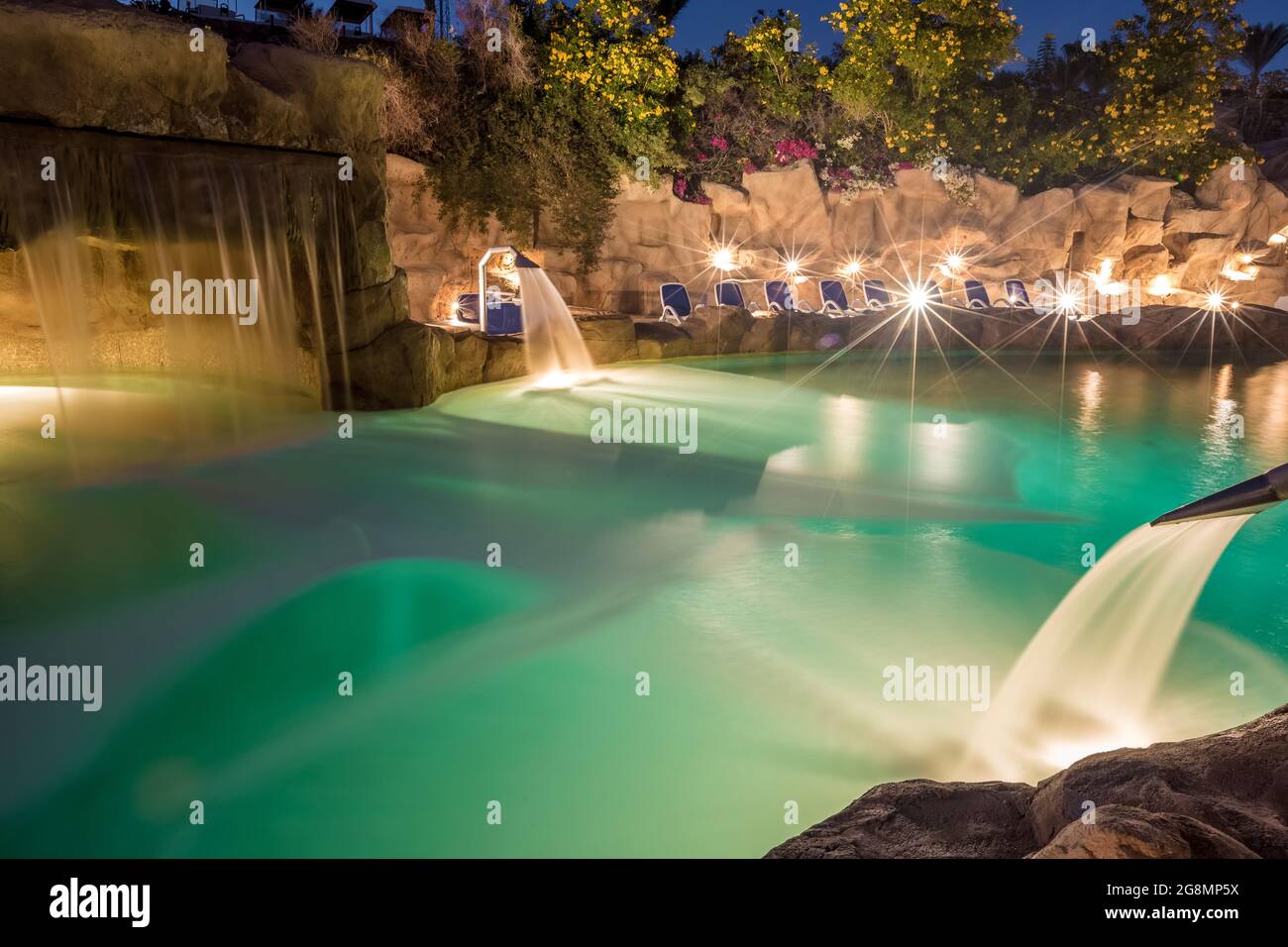 Evening view for luxury swimming pool in night illumination Stock Photo ...