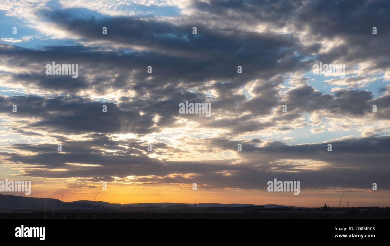 Sunbeam cloud ray sunset gorgeous hi-res stock photography and images - Alamy