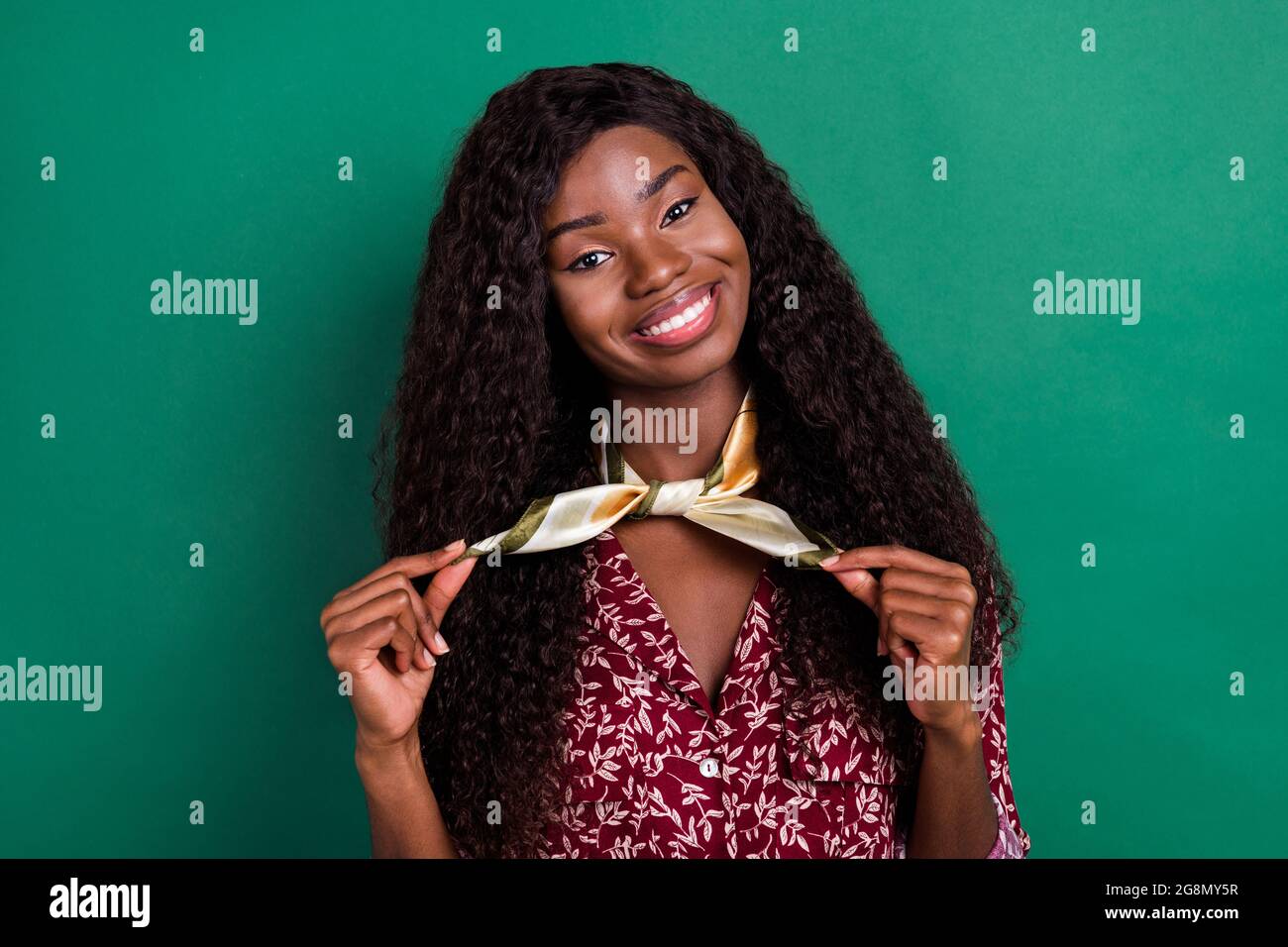 Photo of adorable sweet wavy dark skin lady wear print shirt smiling ...