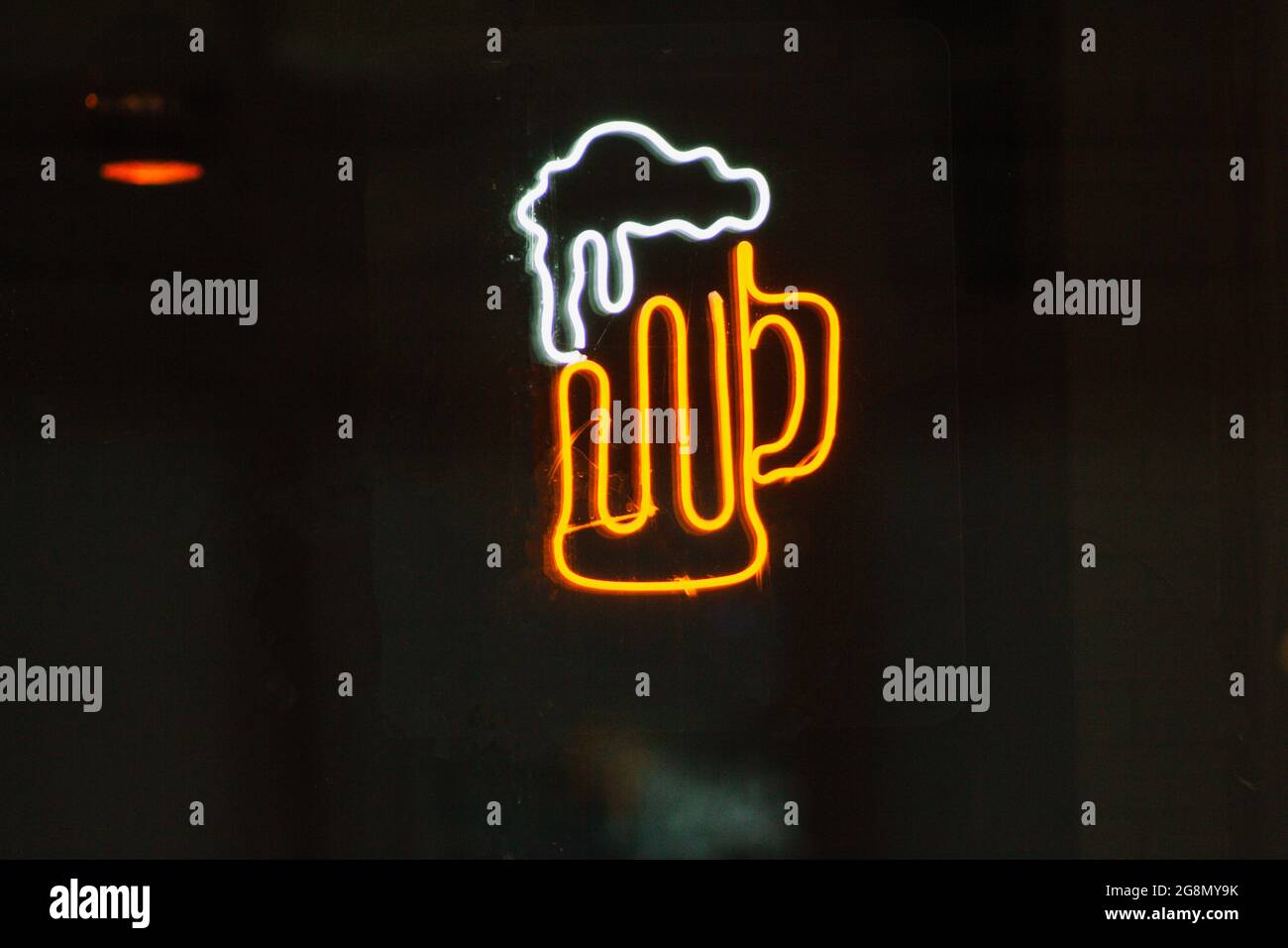 mug beer neon sign showcase window advertisment Stock Photo - Alamy