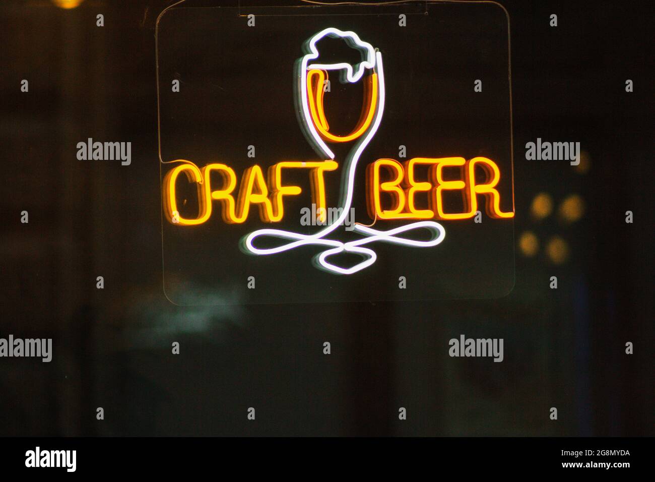 craft beer neon sign showcase window marketing Stock Photo - Alamy
