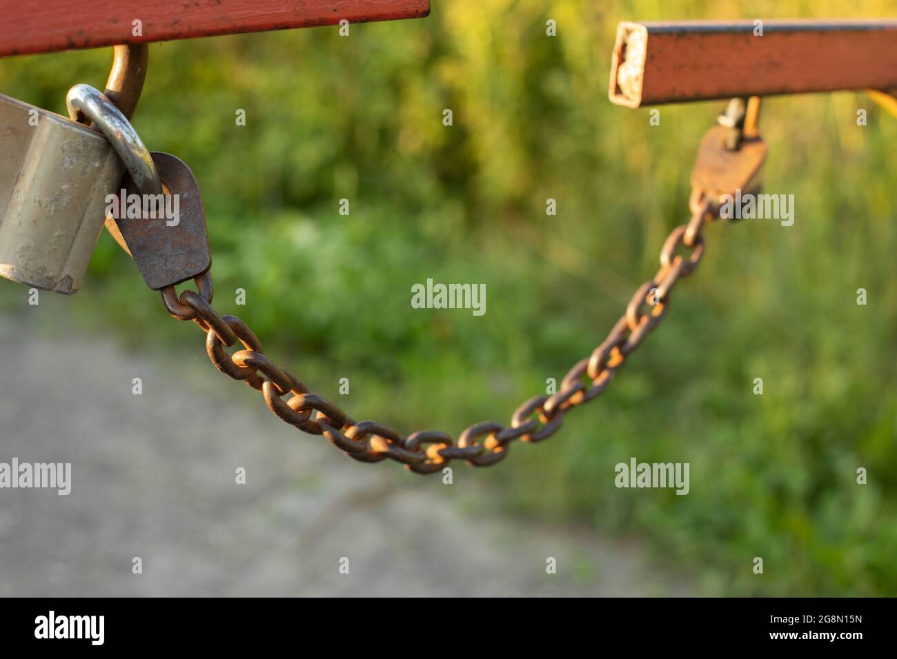 Chain at the barrier. A chain that closes the passage of transport ...