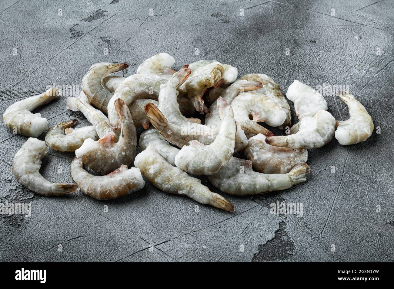 Frozen shell on Tiger Prawns or Asian tiger Shrimps set, on gray stone ...