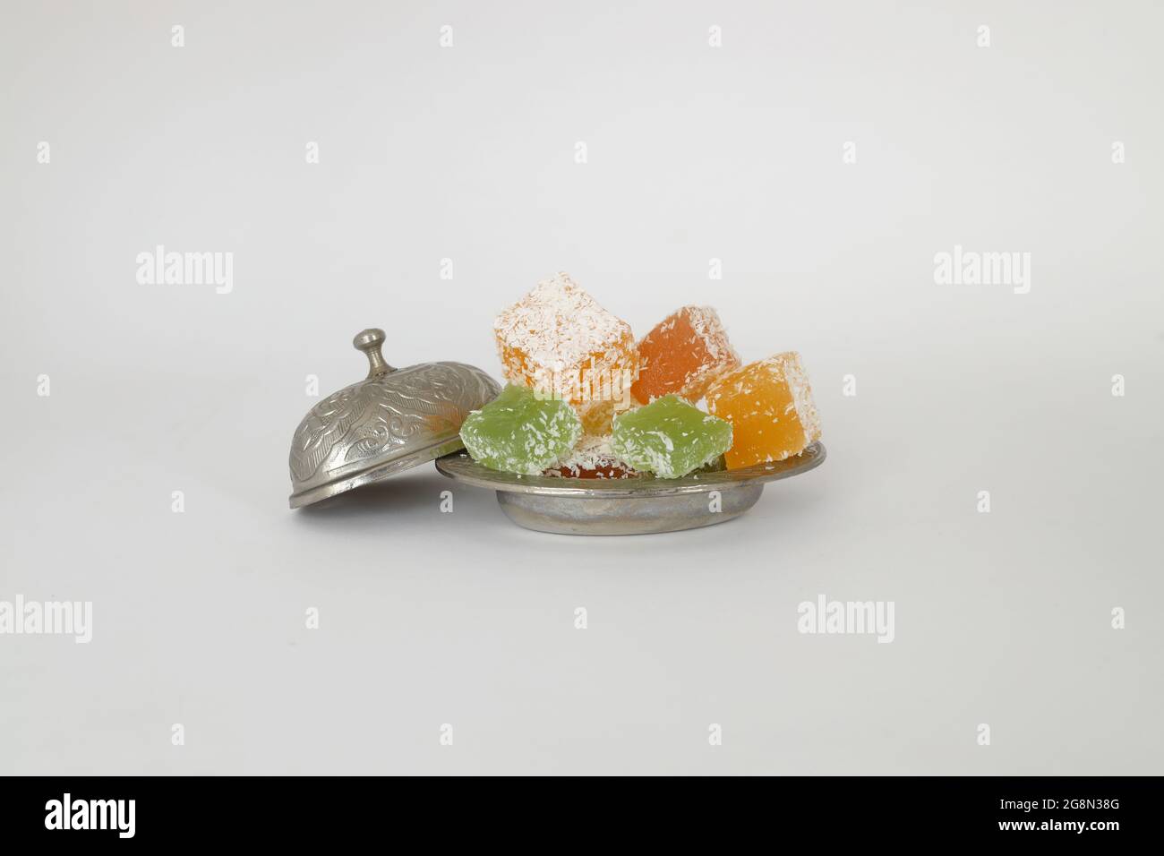 Turkish delight dessert in plate on white background Stock Photo - Alamy