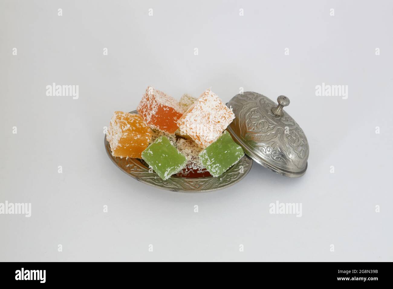 Turkish delight dessert in plate on white background Stock Photo - Alamy