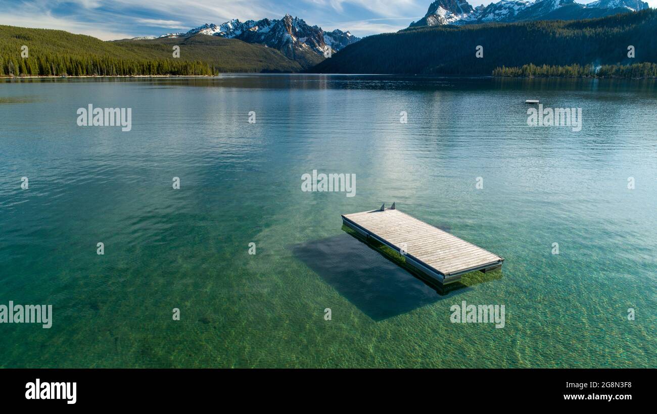 wooden dock out on the pretty lake Stock Photo - Alamy