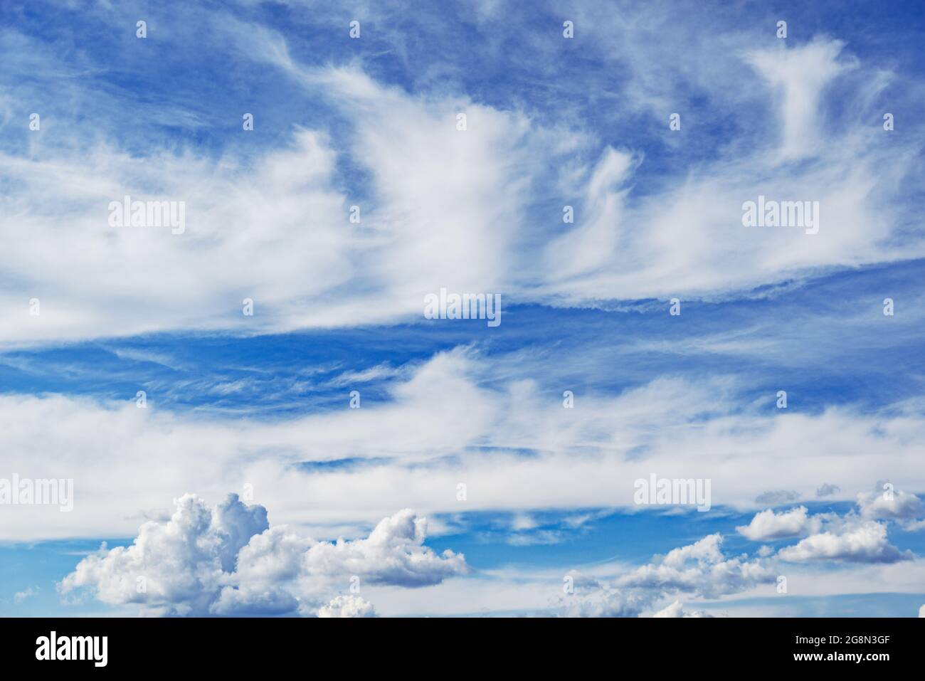 Small clouds on the blue sky. Cloudscape at day time Stock Photo - Alamy