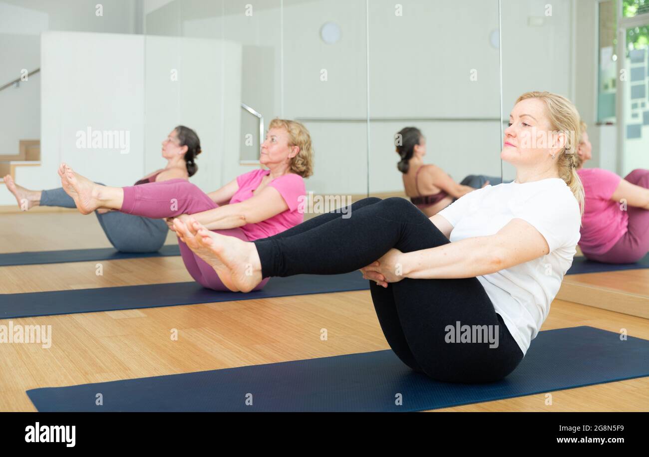 Woman paripurna navasana boat pose hi-res stock photography and images ...