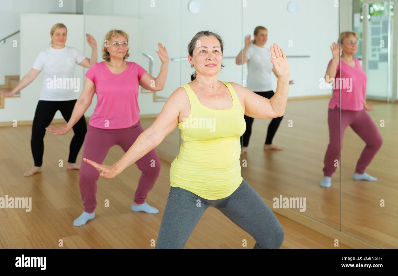 Adults training swing steps at dance class Stock Photo - Alamy