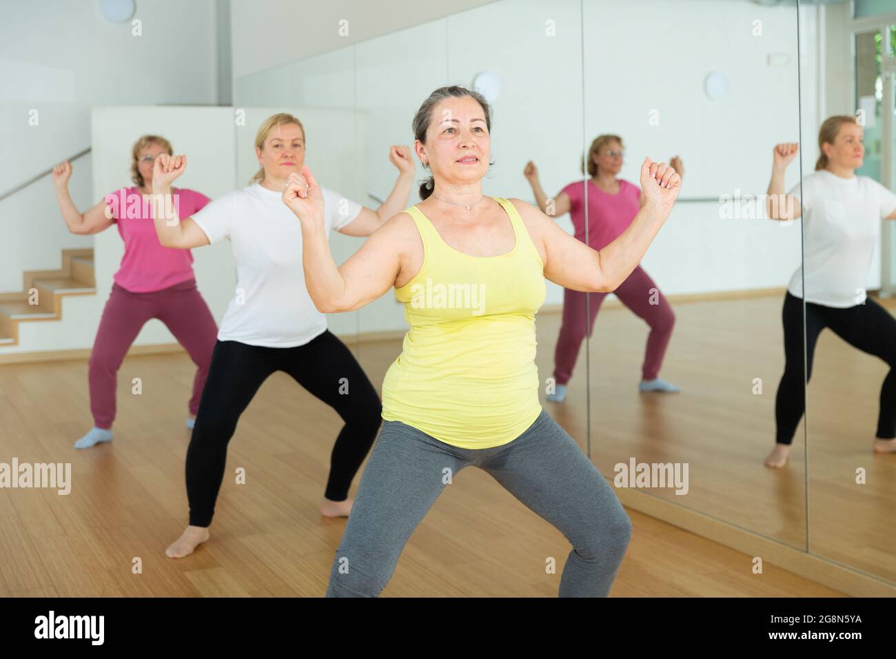 Three women are dancing Stock Photo - Alamy