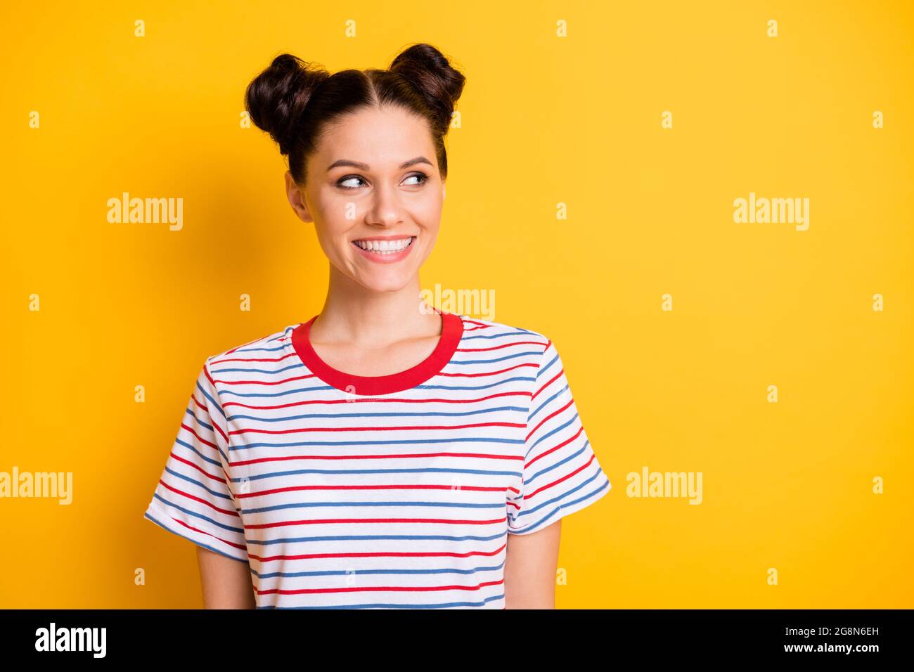 Photo of sweet funny young woman wear striped t-shirt lokking empty ...
