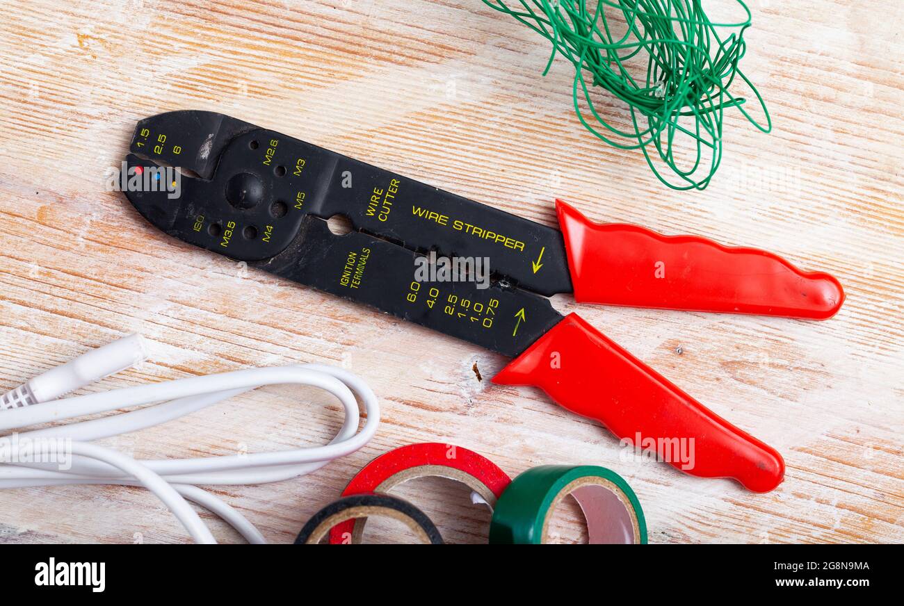 Manual wire stripper Stock Photo - Alamy