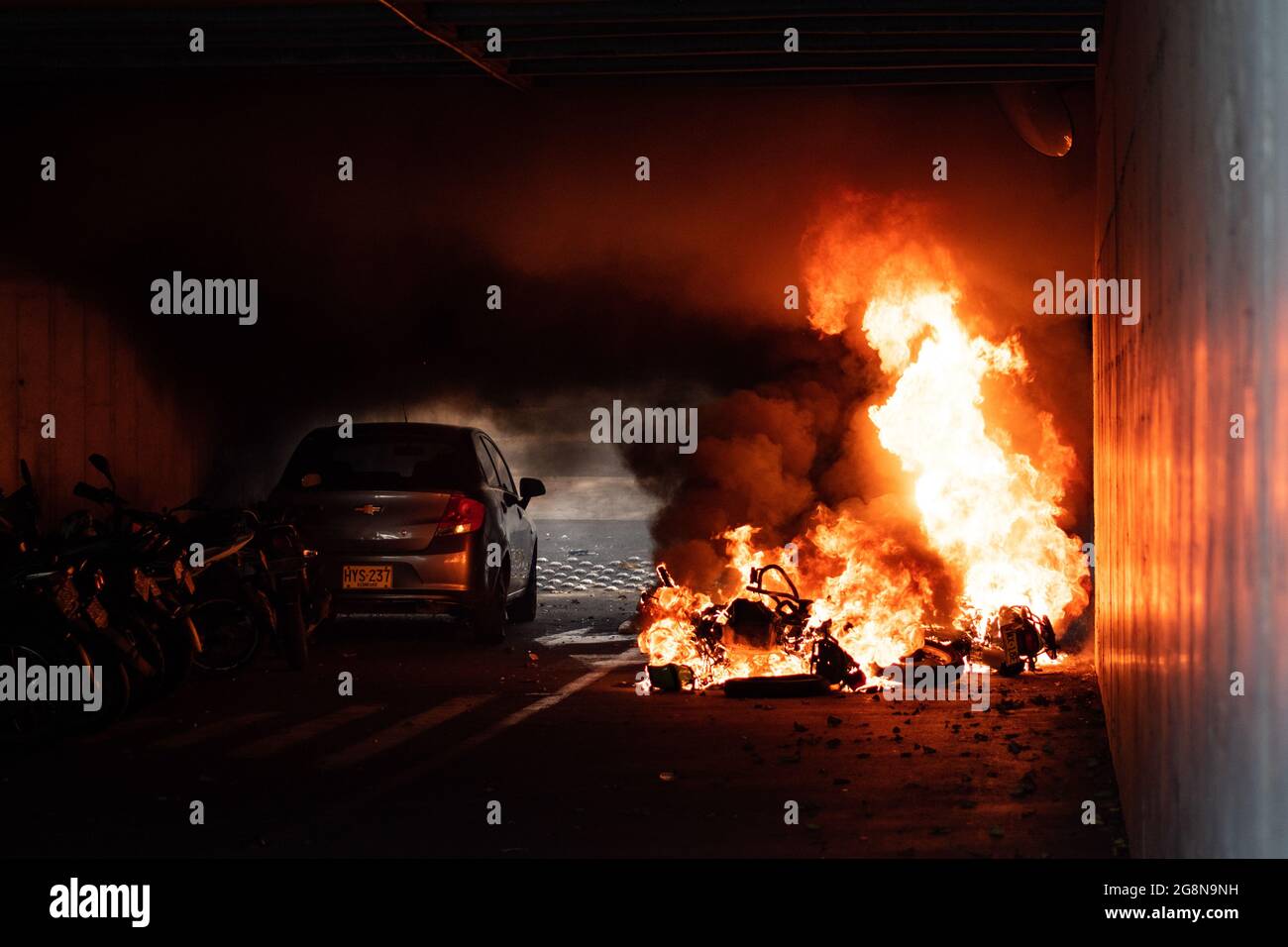 A set of riot police motorbikes burnt during a new day of anti ...