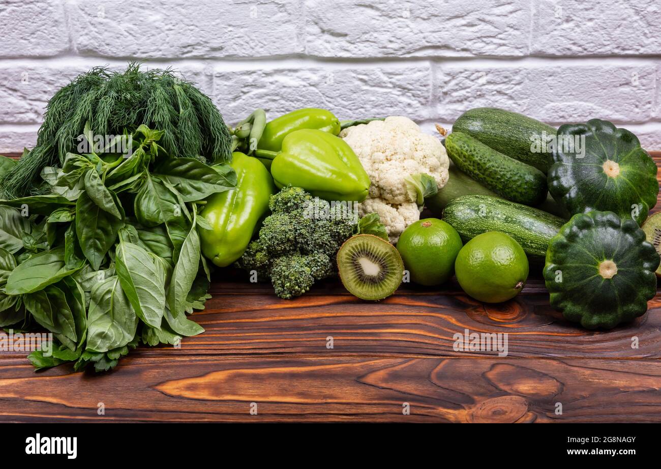 Colorful summer vegetable frame. Variety of raw green vegetables Stock ...