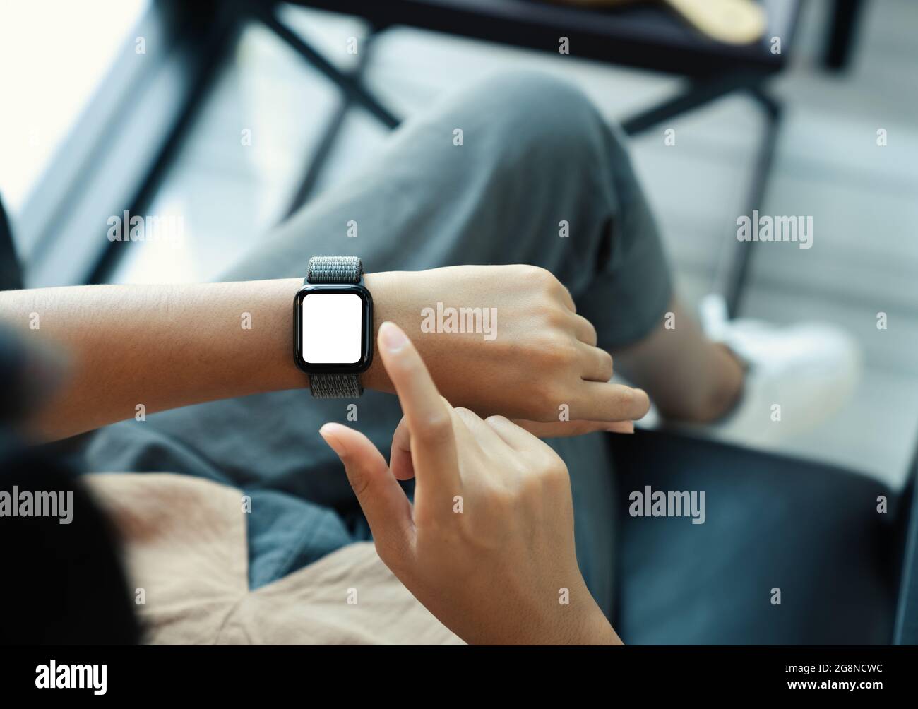 woman using smartwatch blank screen on top view Stock Photo - Alamy